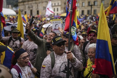 Thousands of Colombians take to the streets to reject proposed reforms ...