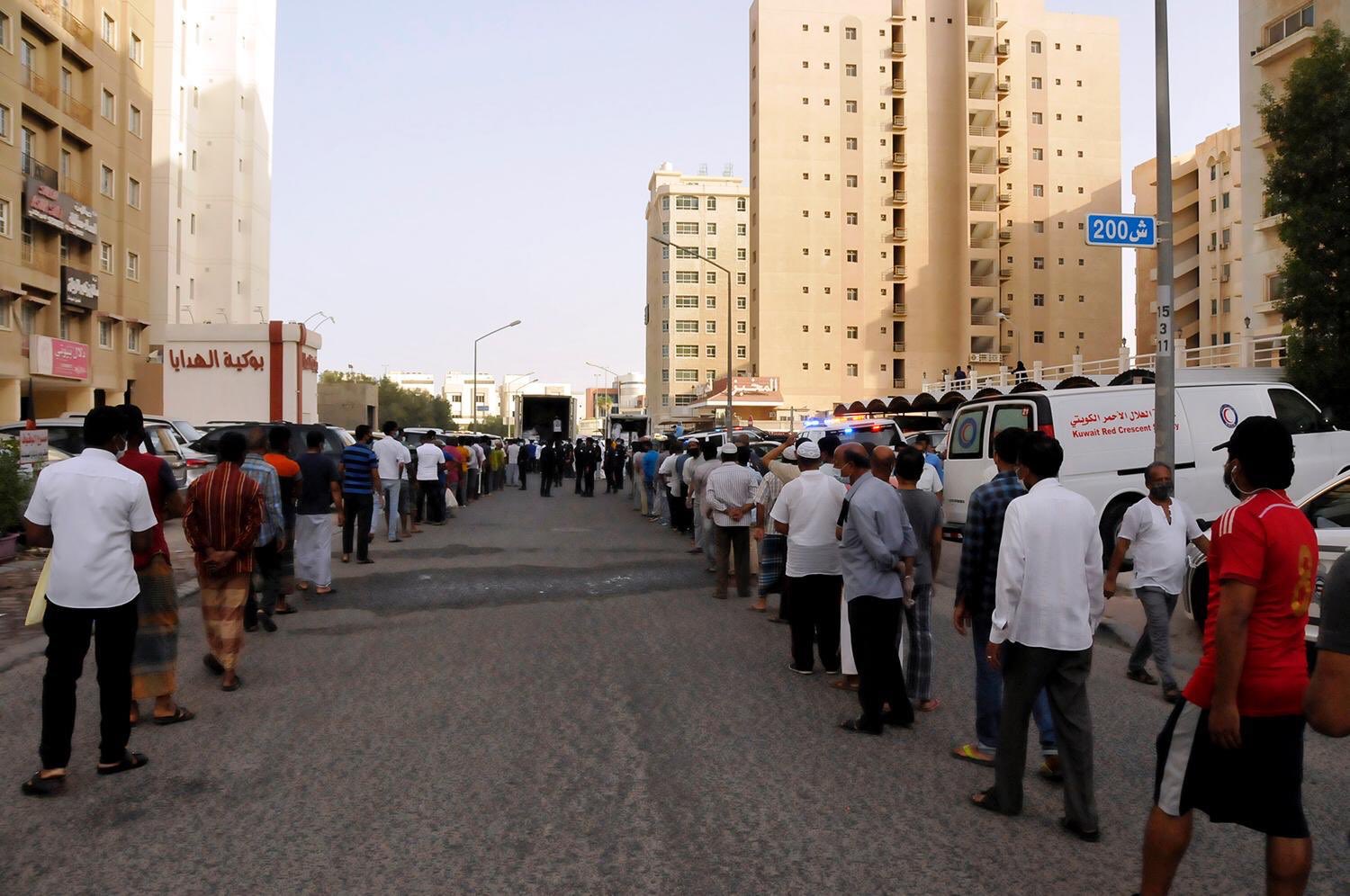 Kuwait Red Crescent feeds expats in Sabah Al-Salem | arabtimes
